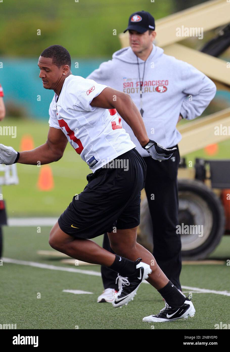 San Francisco 49ers coach Jim Harbaugh watches California linebacker ...
