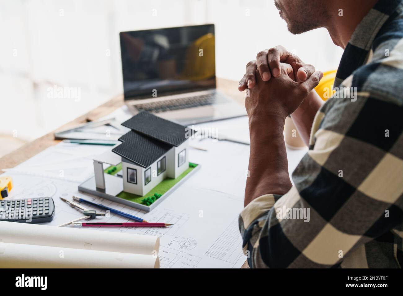 Group of professional engineering people brainstorming at meeting and ...