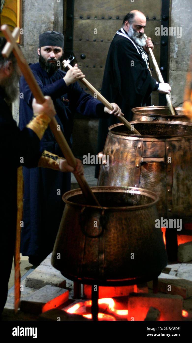 Georgian Orthodox priests prepare Chrism in Svetitskhoveli cathedral in ...