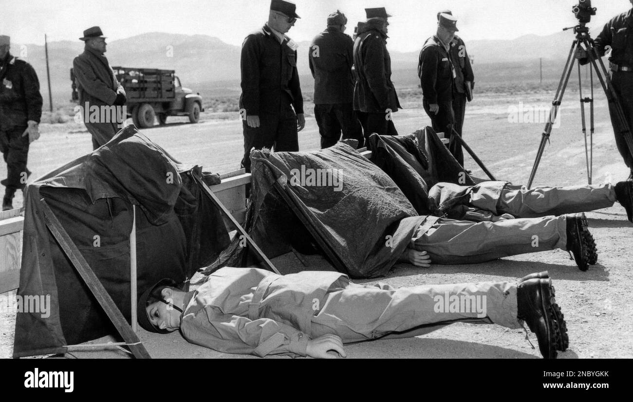 Three dummies dressed in the Army’s new field uniform are arranged on ...