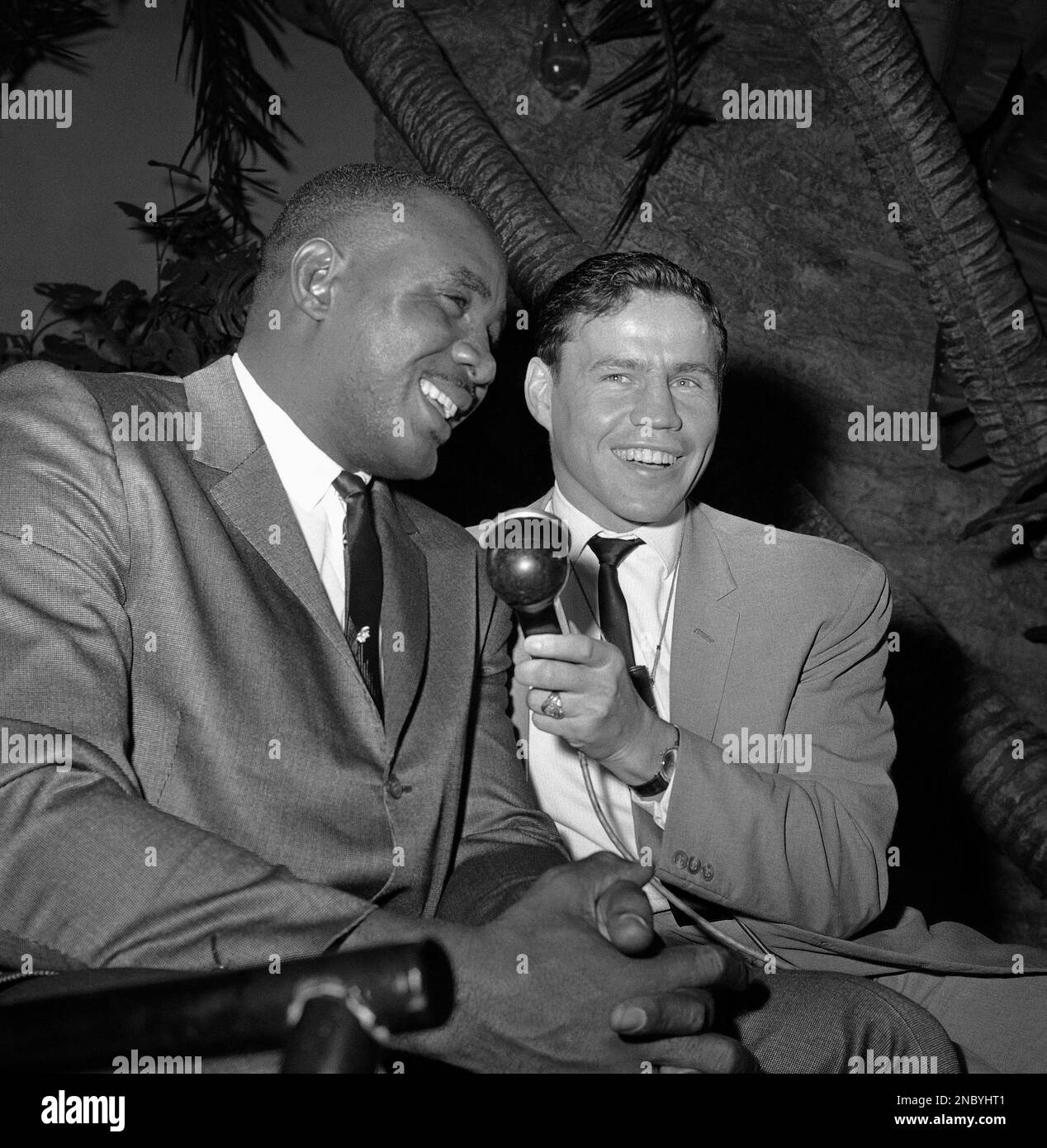 World heavyweight boxing champion Sonny Liston, left, appears to be in ...