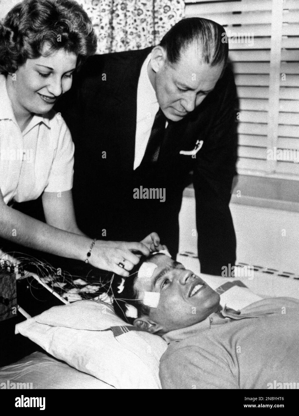 World Middleweight champion, Terry Downes, of London, undergoes an ...