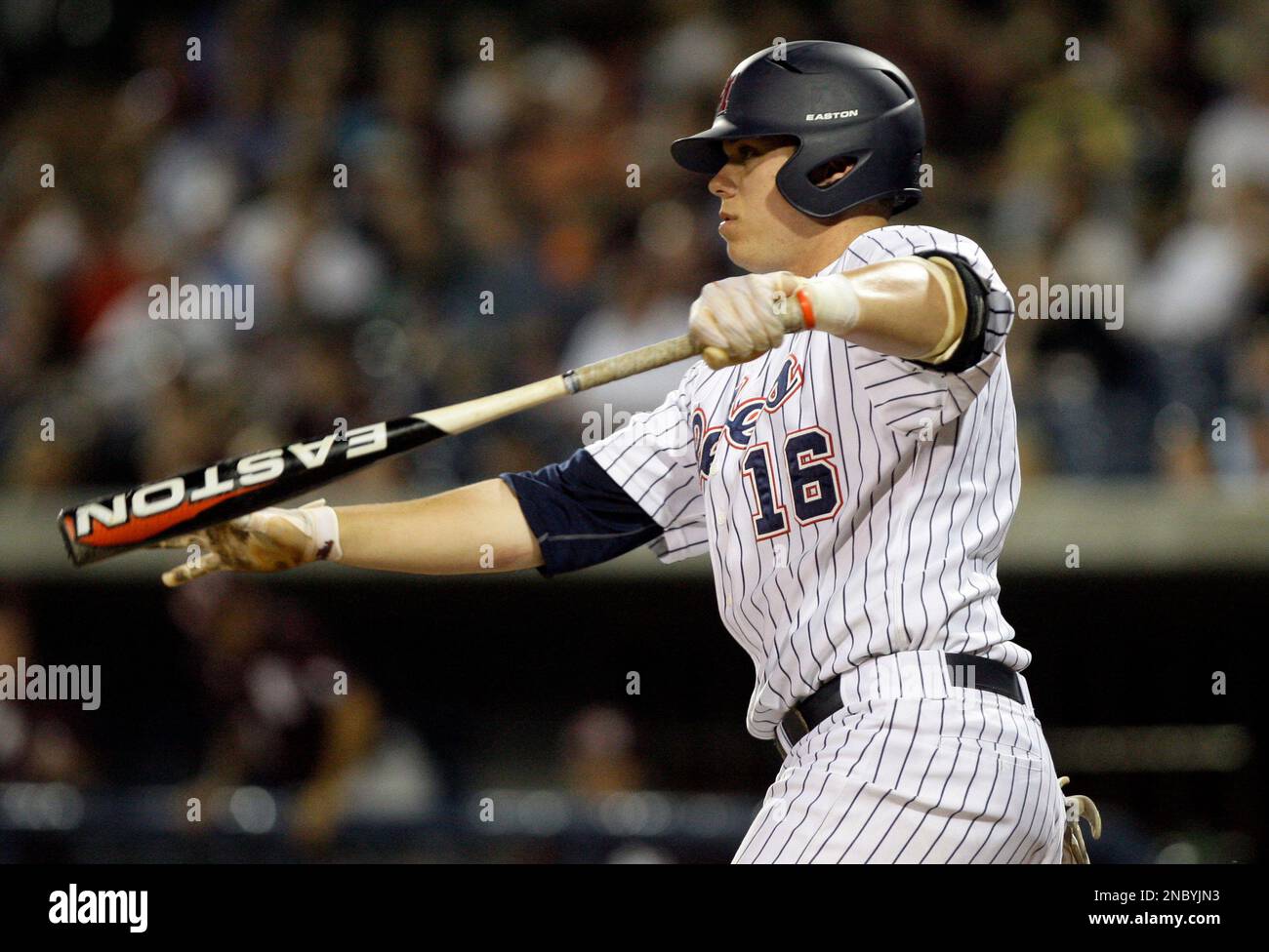Mississippi's Matt Smith swings on a strike in the sixth inning against ...