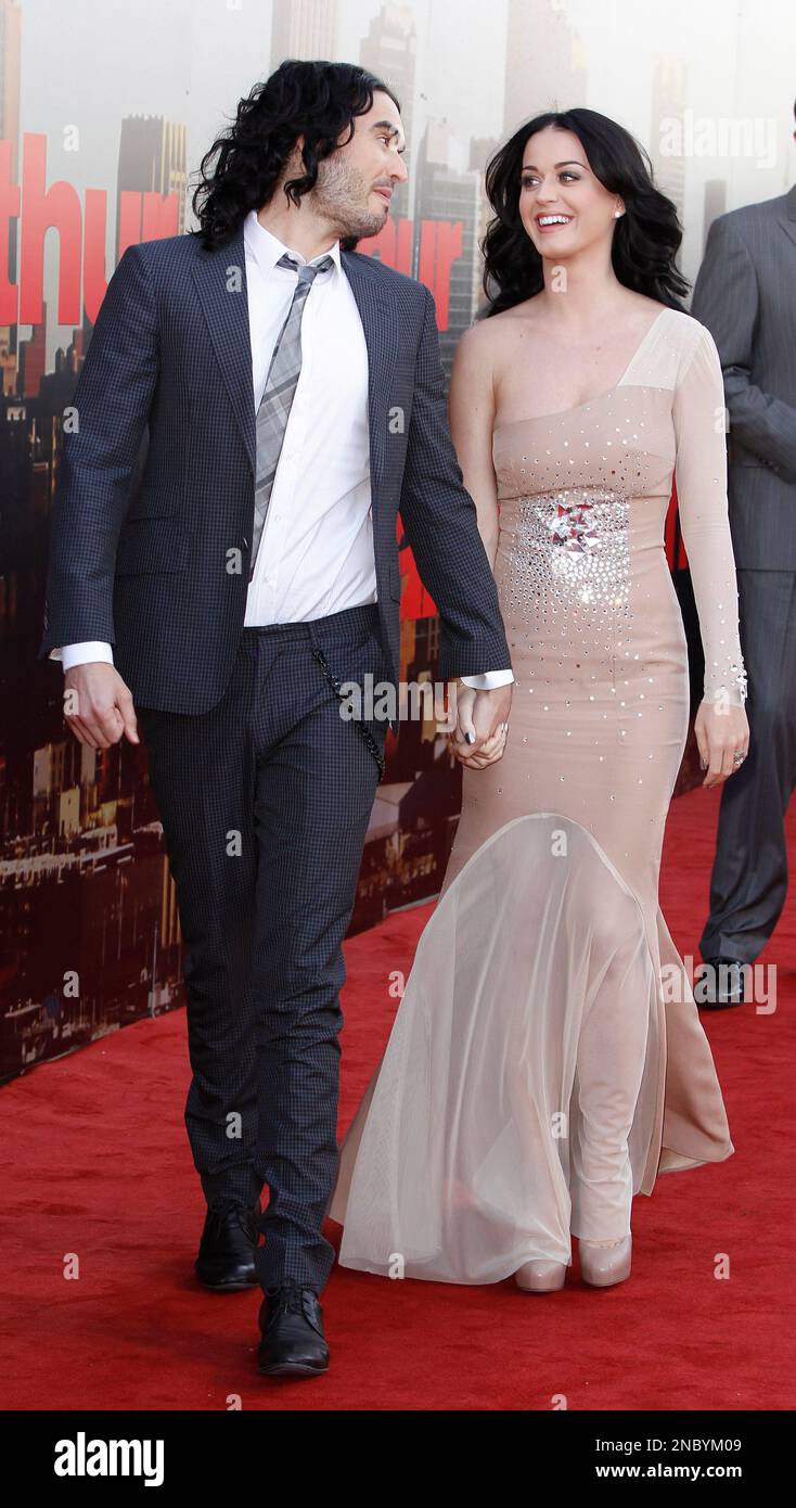 British actor Russell Brand and his wife Katy Perry arrive for the ...