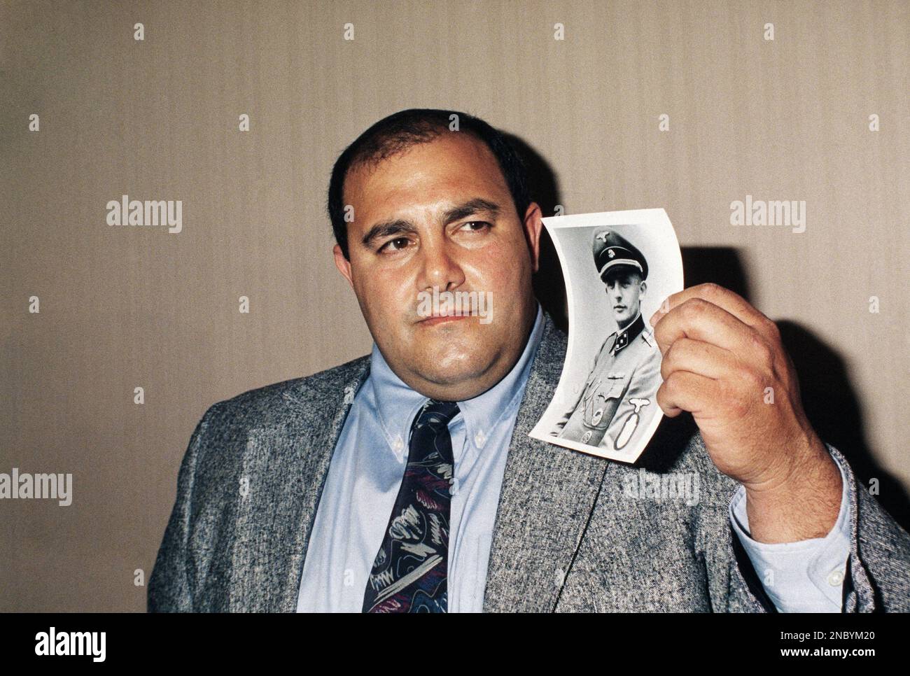 Yaron Svoray holds a picture reputed to of Karl Wilhelm Krause, the ...