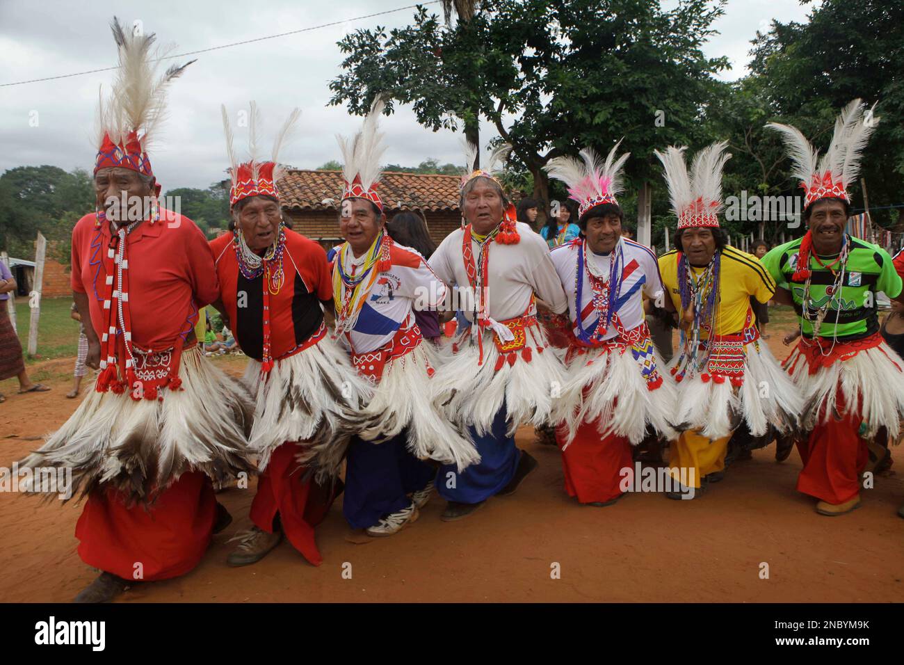 Men from the Maca ethnic group, dance during the celebrations of the ...