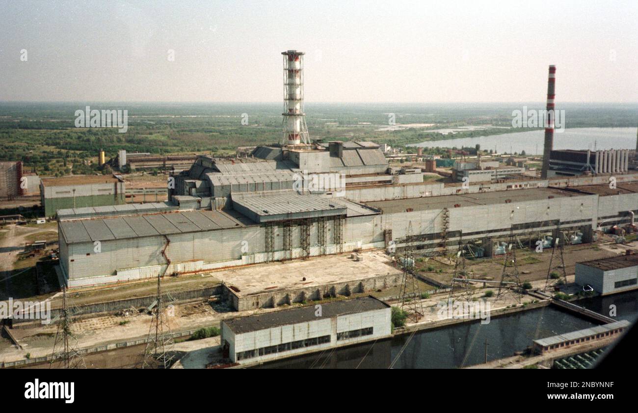 FILE - In this July 23, 1998 file photo, a chimney towers over the ...
