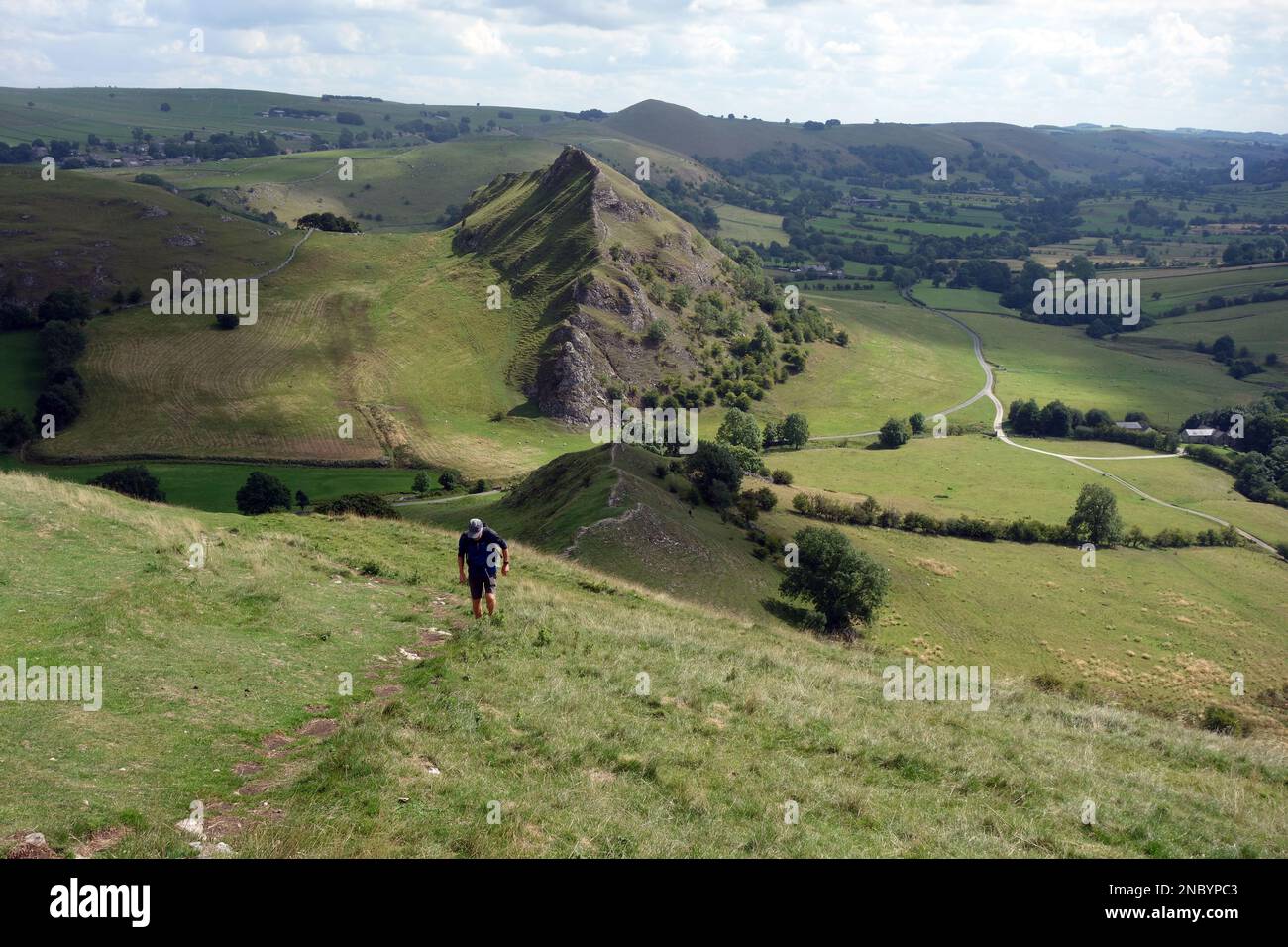 Man Walking on the Ridge Path of Chrome Hill with Parkhouse Hill in the ...