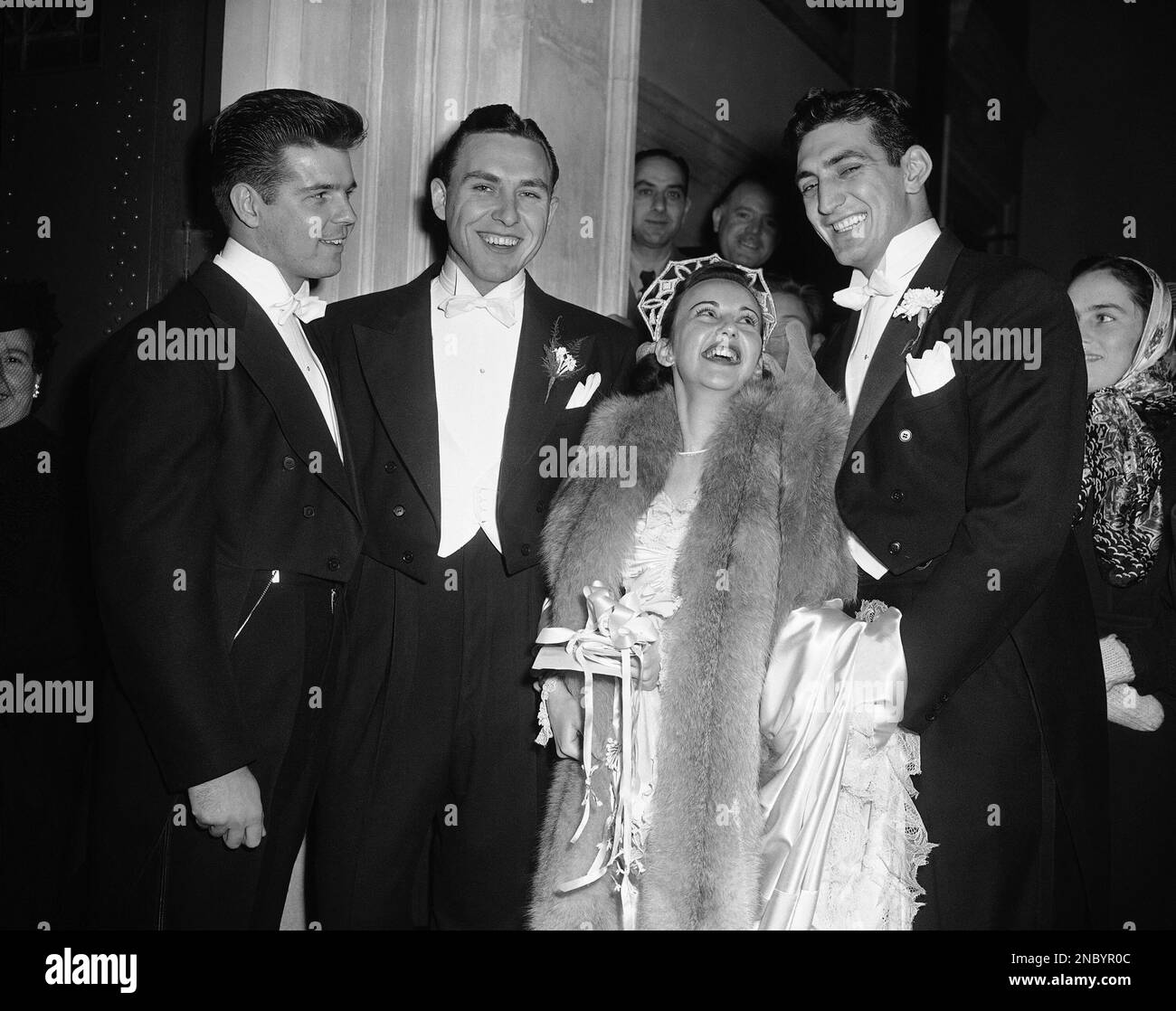 Gil Hodges (second from left), Brooklyn Dodger catcher, stands with his ...