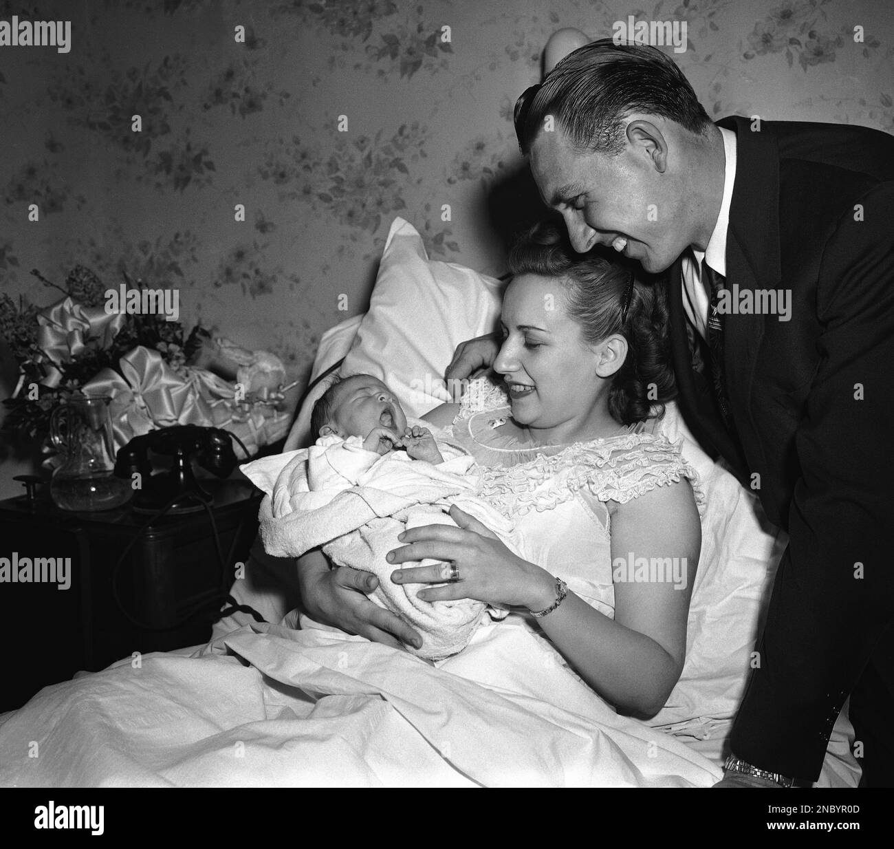 Gil Hodges, Brooklyn Dodgers first baseman and his wife gaze proudly at ...