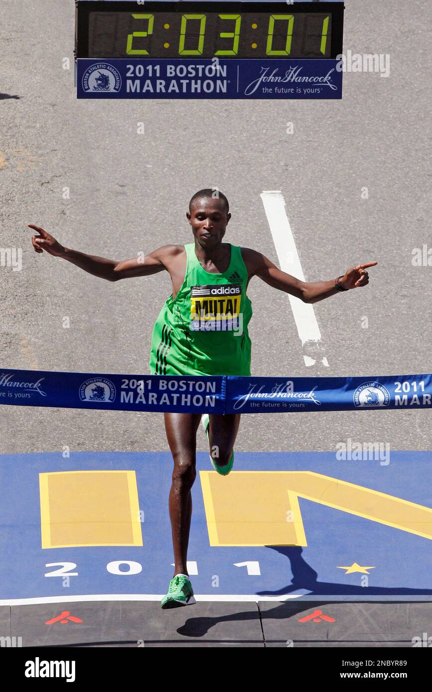Geoffrey Mutai of Kenya, takes the final strides of the fastest ...