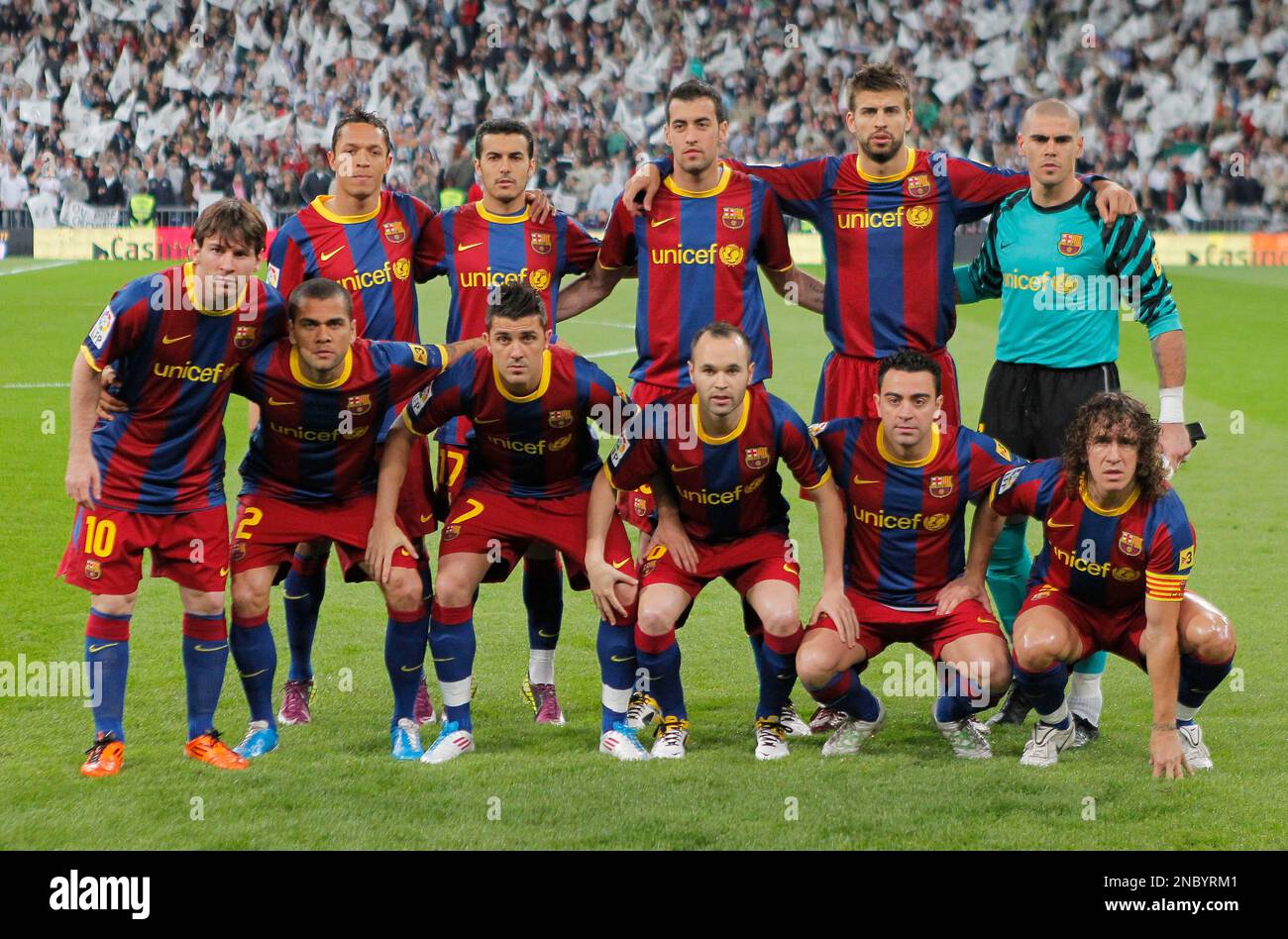 FILE - In this Abril 16, 2011 file photo, FC Barcelona players pose for ...