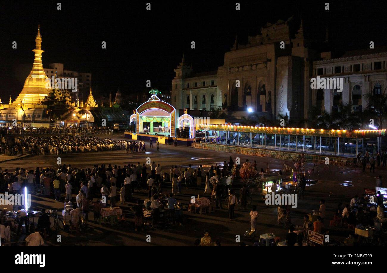 Revelers enjoy a show during Myanmar's four-day New Year water festival ...