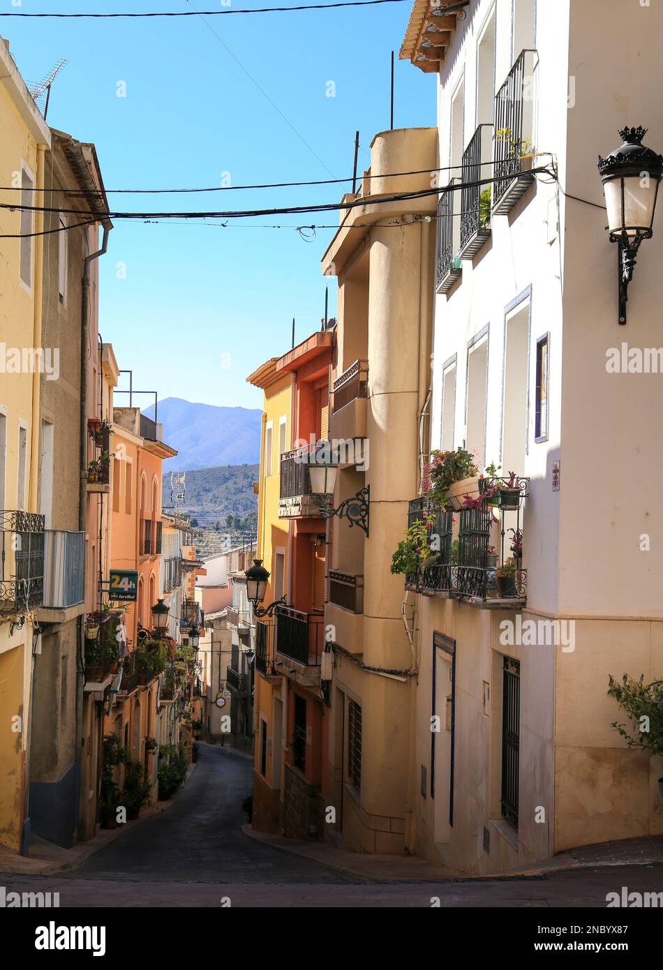 Relleu, Alicante, Spain- February 5, 2023: Narrow cobbled street and ...