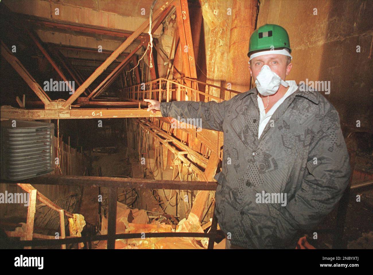 FILE - In this Nov.10, 2000 file photo an investigator points at the ...