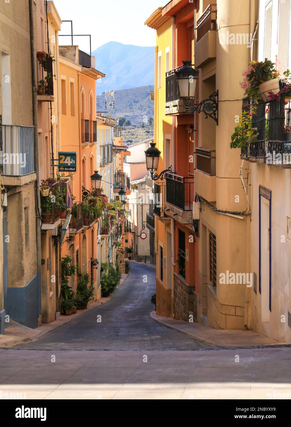 Relleu, Alicante, Spain- February 5, 2023: Narrow cobbled street and ...