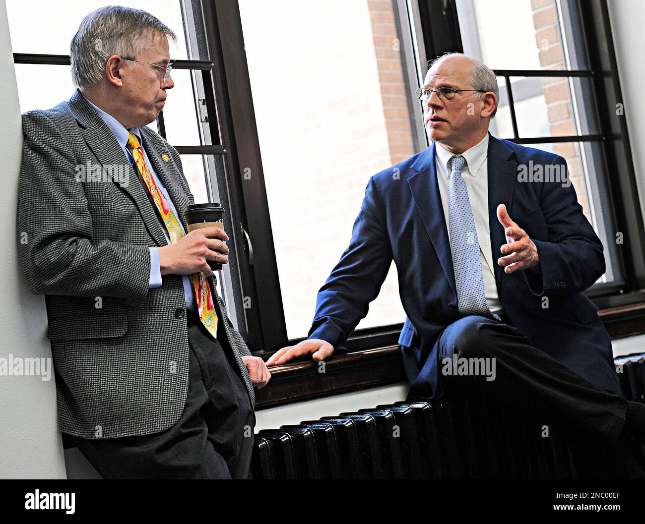 Rep. Mike Doogan, D-Anchorage, left, talks with Sen. John Coghill, R ...