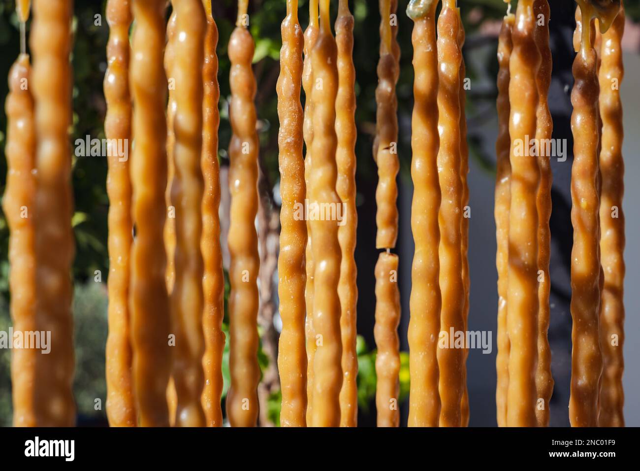 Traditional Cypriot Soutzoukos or shoushoukos, similar to churchkhela ...