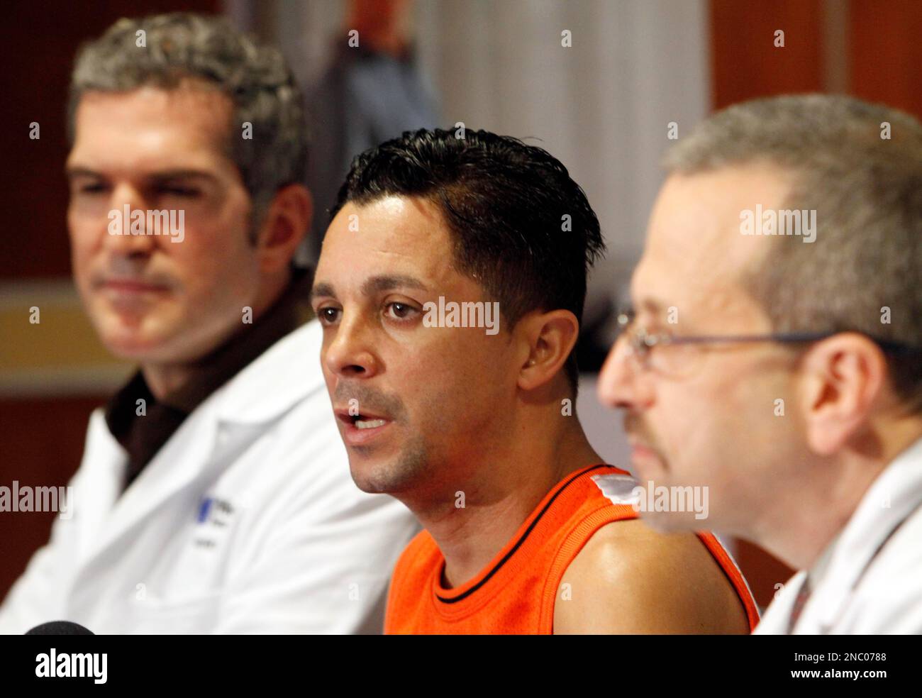 Horse racing jockey Eibar Coa, of Venezuela, center, flanked by Doctors ...