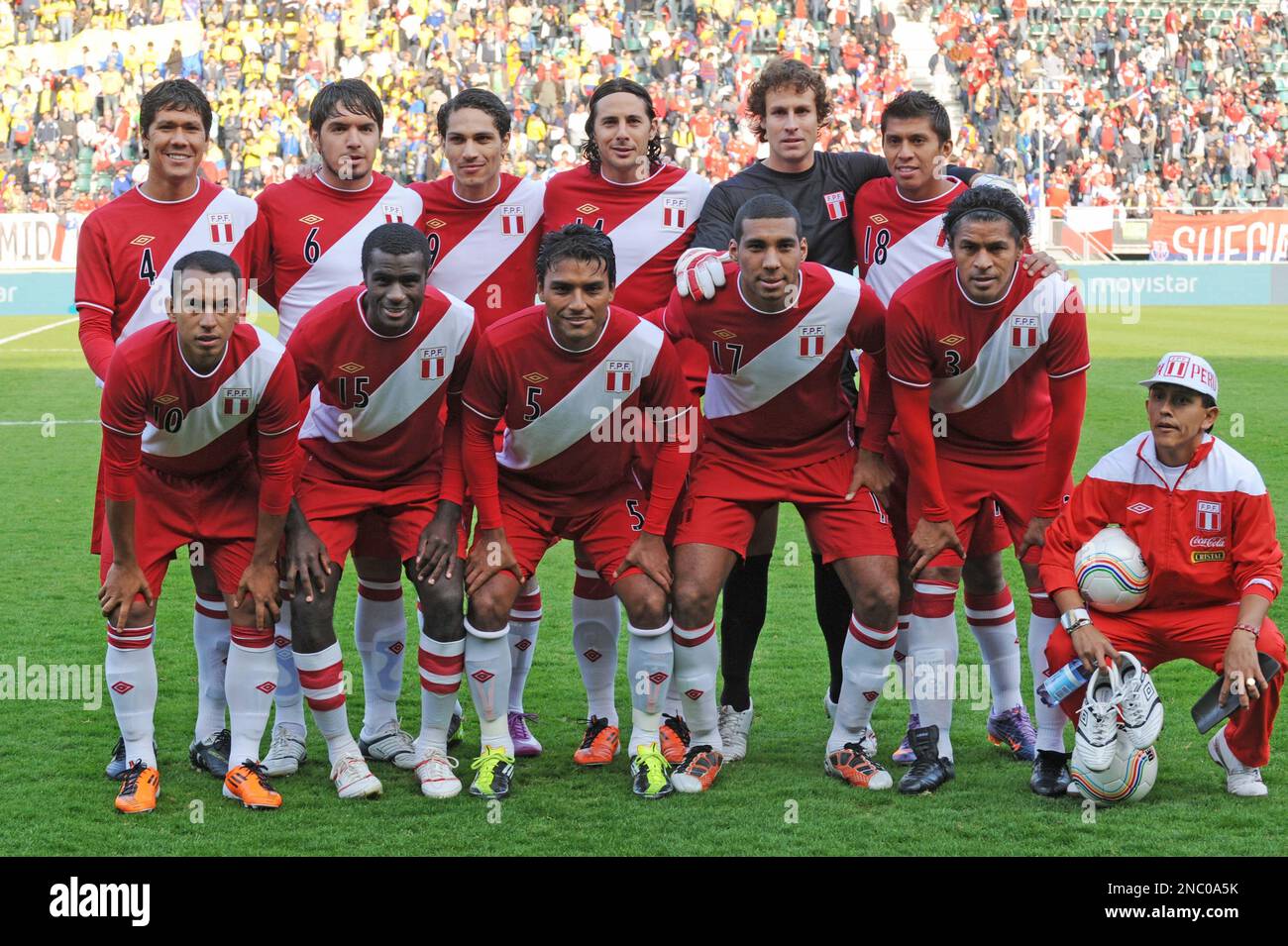 Peru's soccer players pose for a team picture, front row from left to ...