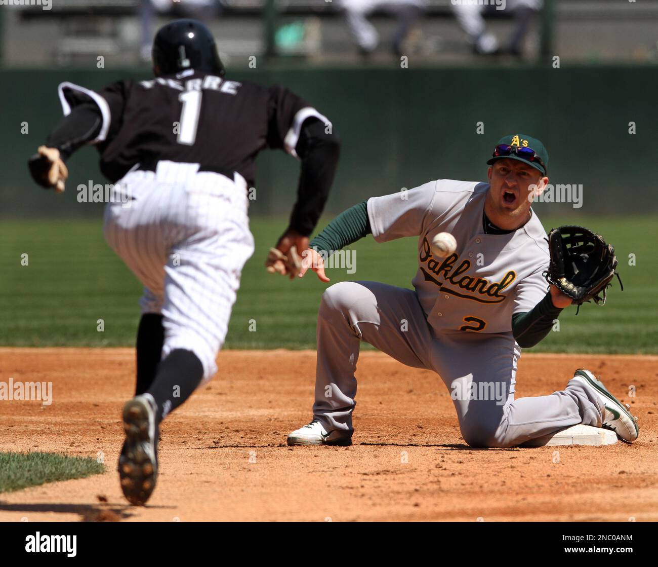 Oakland Athletics short stop Cliff Pennington takes the throw as ...