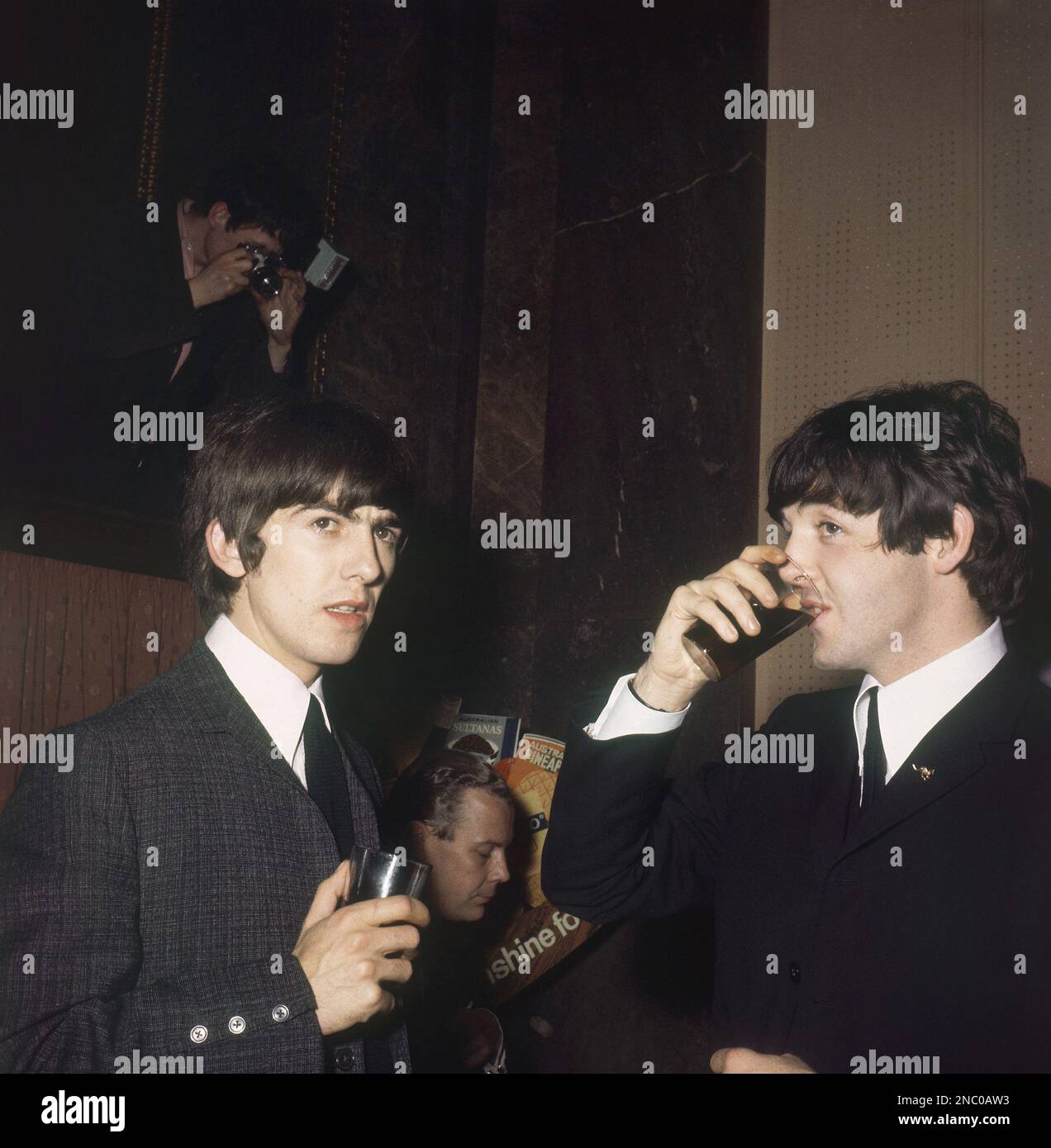 George Harrison, left, and Paul McCartney of the Beatles have ...
