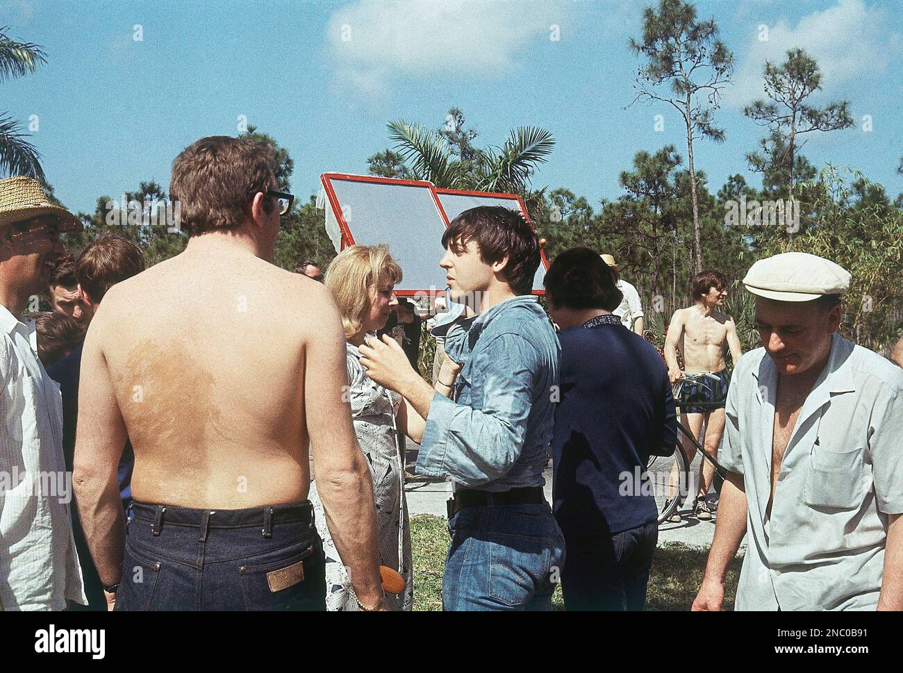 Paul McCartney of the Beatles, center, stands in the middle of the ...