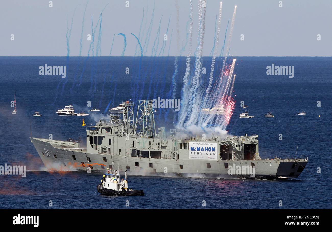 Fireworks explode on the Ex-HMAS Adelaide, a decommissioned RAN warship ...
