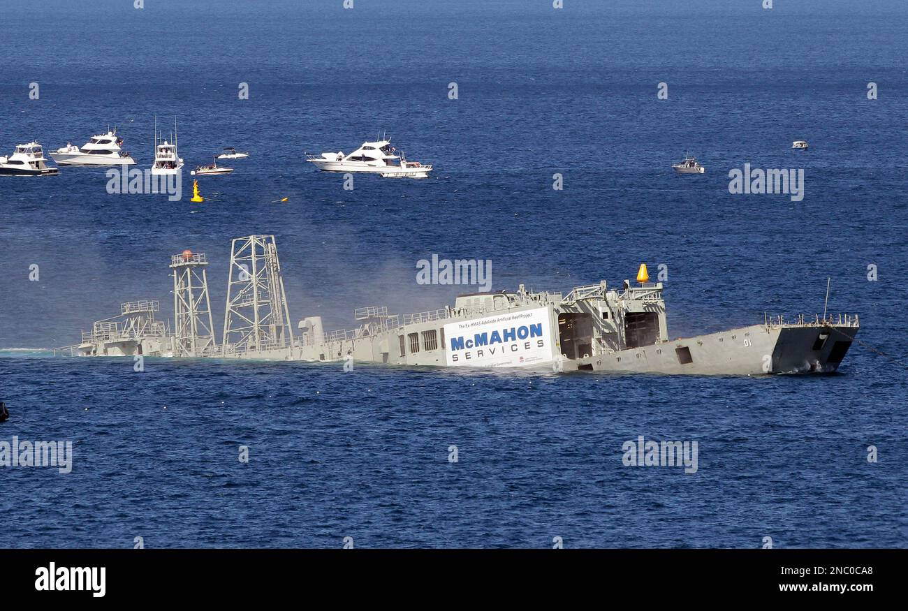 Decommissioned Australian naval ship HMAS Adelaide goes its bow down ...