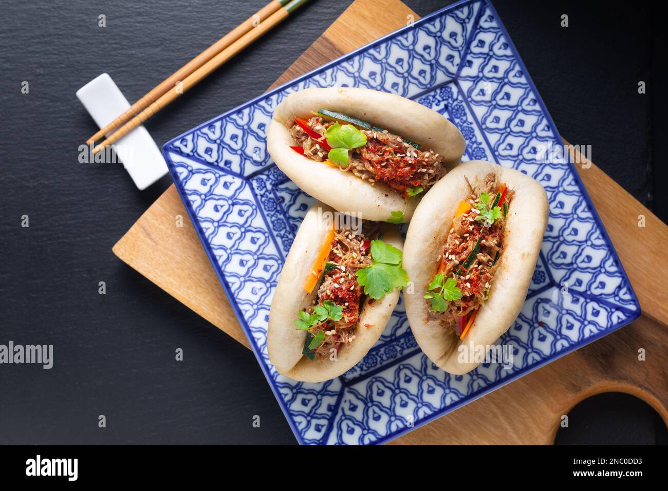 Food concept Homemade organic Pulled Beef Bao Buns or Gua Bao in sqare ...