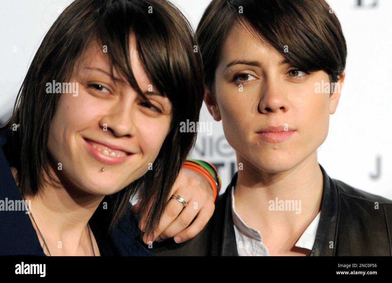 Twin sisters Tegan, left, and Sara Quin of the band Tegan and Sara pose ...