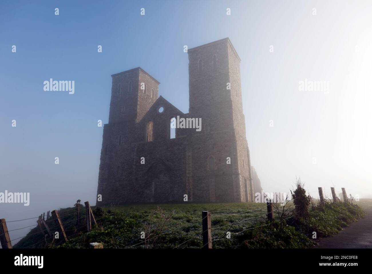 View the remains of St Mary's Church in early morning freezing fog, at ...