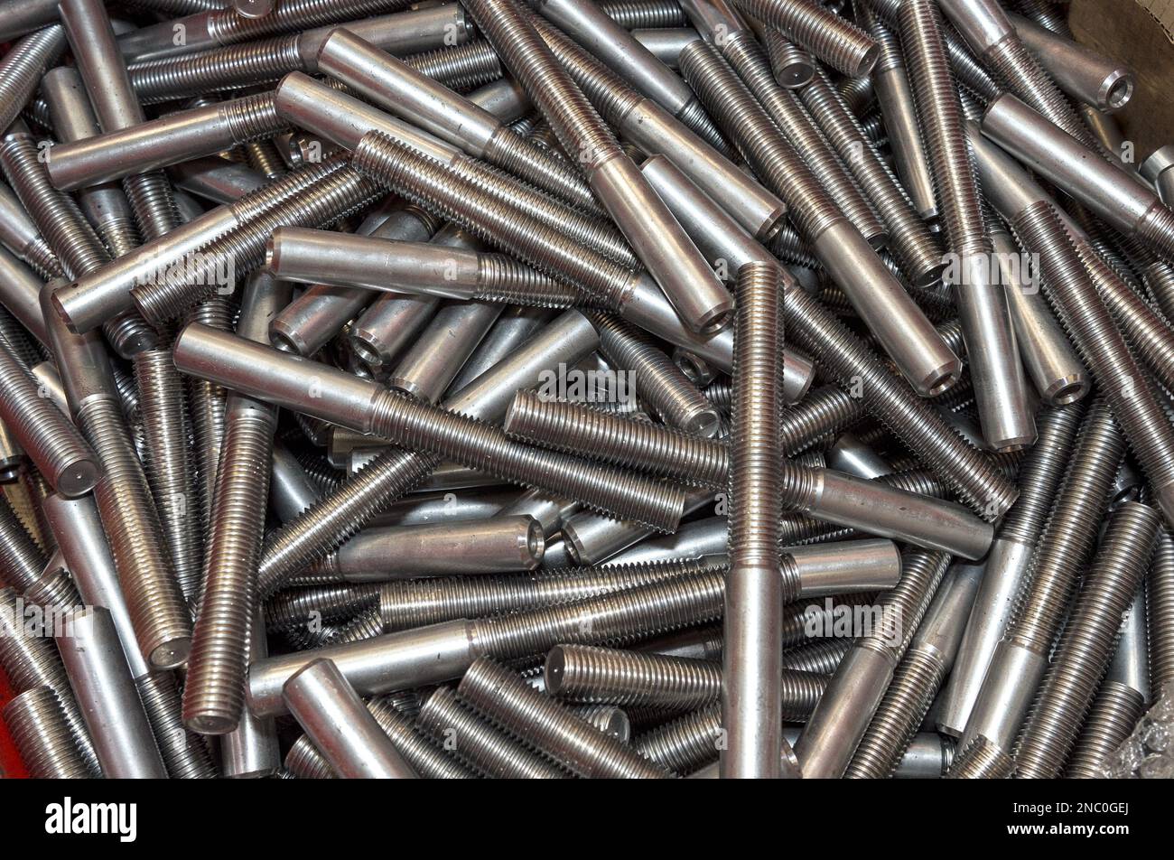 Pile of threaded bolts Stock Photo - Alamy