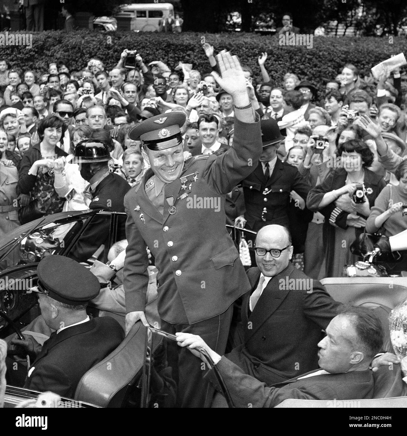 Major Yuri Gagarin, the Russian astronaut, waves his greeting to ...
