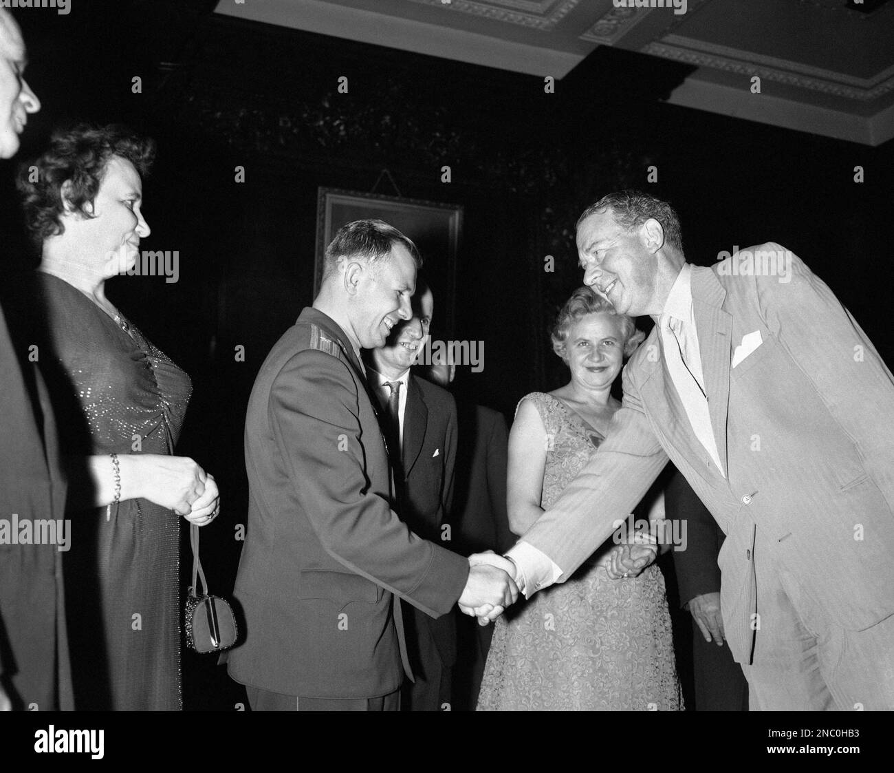 Mr. Hugh Gaitskell, leader of the opposition, shakes hands with Major ...