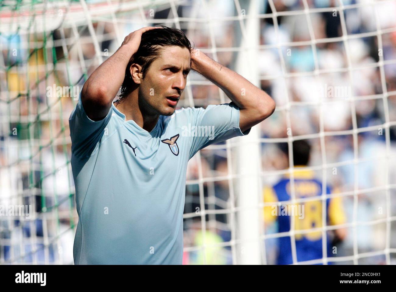Lazio forward Giuseppe Sculli reacts after missing a scoring chance ...