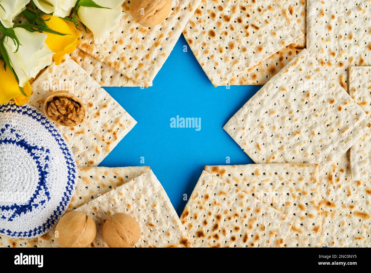 Passover celebration concept. Blue Star of David made from matzah ...