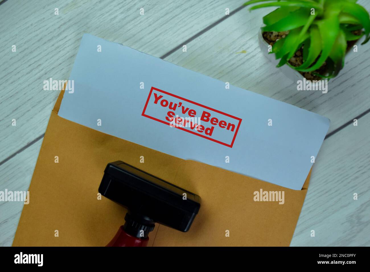 Concept of Red Handle Rubber Stamper and You've Been Served text ...