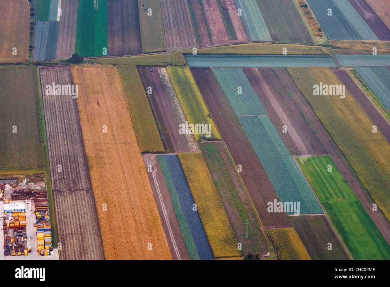 Colorful fields seen through the plane window near Warsaw airport Stock ...