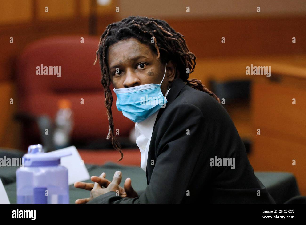 Young Thug, whose real name is Jeffery Williams, waits for the jury ...