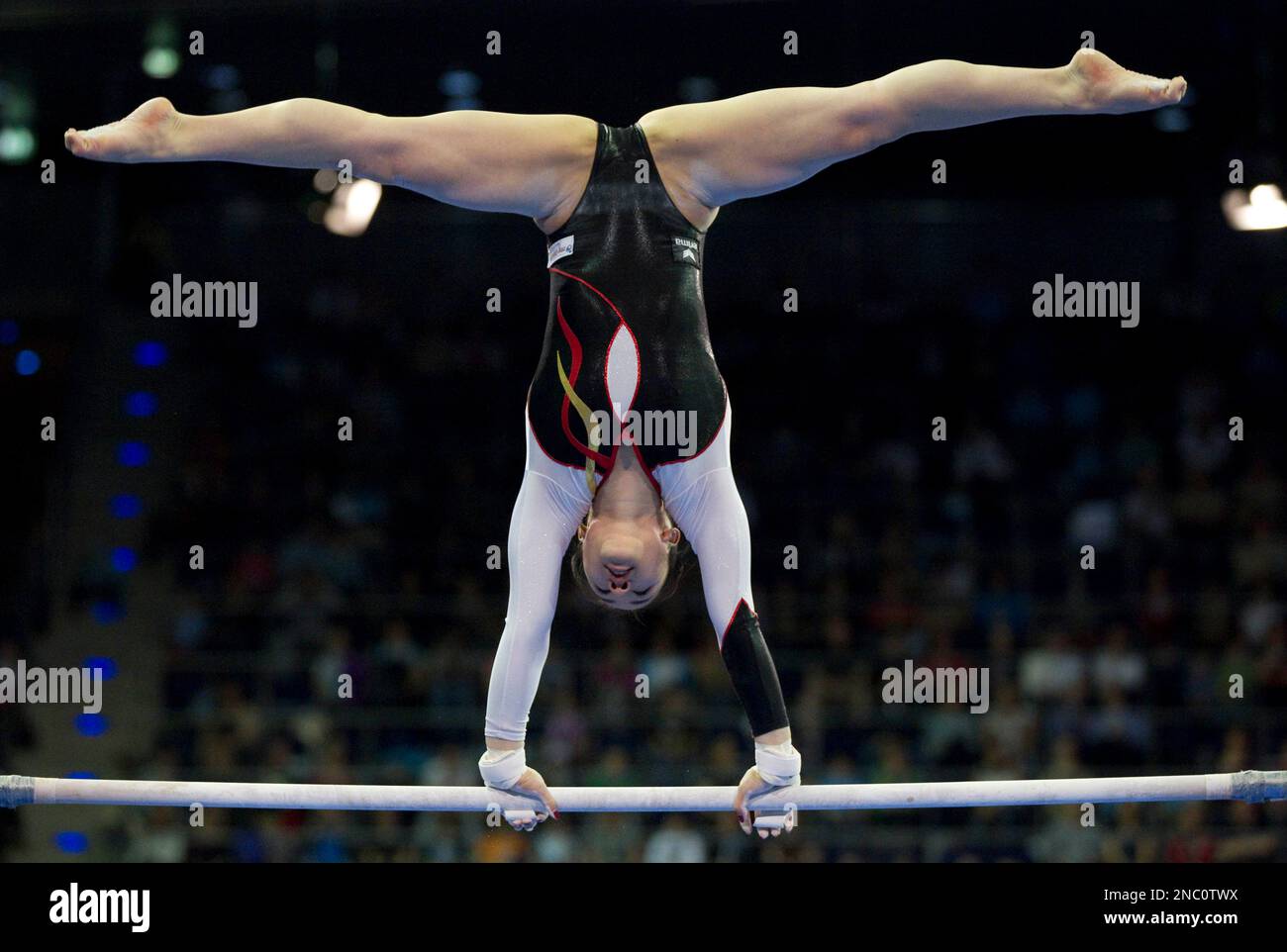 Kim Bui of Germany performs in the women's uneven bars final during the ...