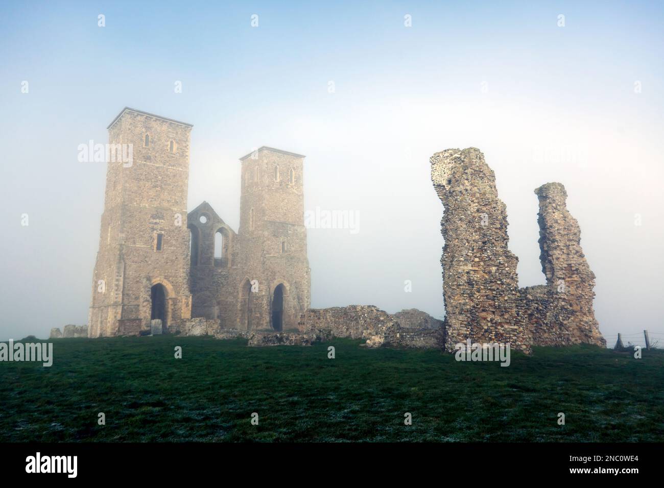 View the remains of St Mary's Church in early morning freezing fog, at ...