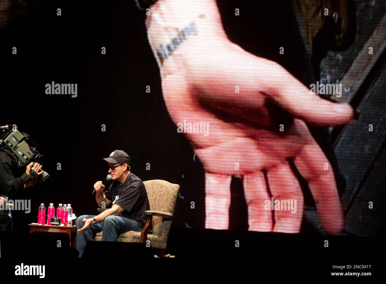 Charlie Sheen appears onstage at his “Violent Torpedo of Truth” show at ...