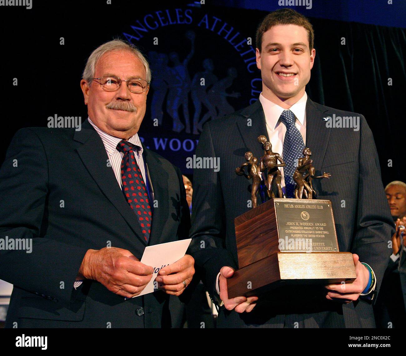 Jim Wooden, left, son of former UCLA basketball coach John Wooden ...