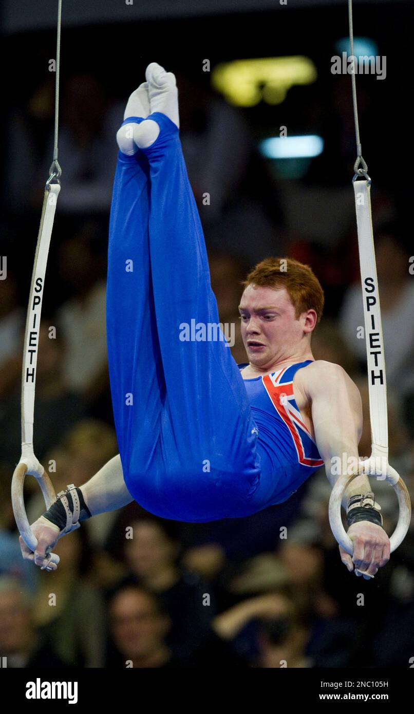 Daniel Purvis of Britain performs on the rings during the men's ...