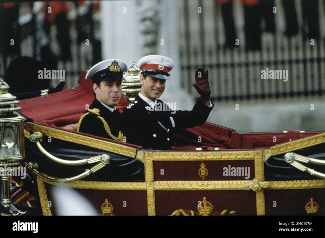 Prince Andrew, left, and his best man, brother Prince Edward, wave to ...