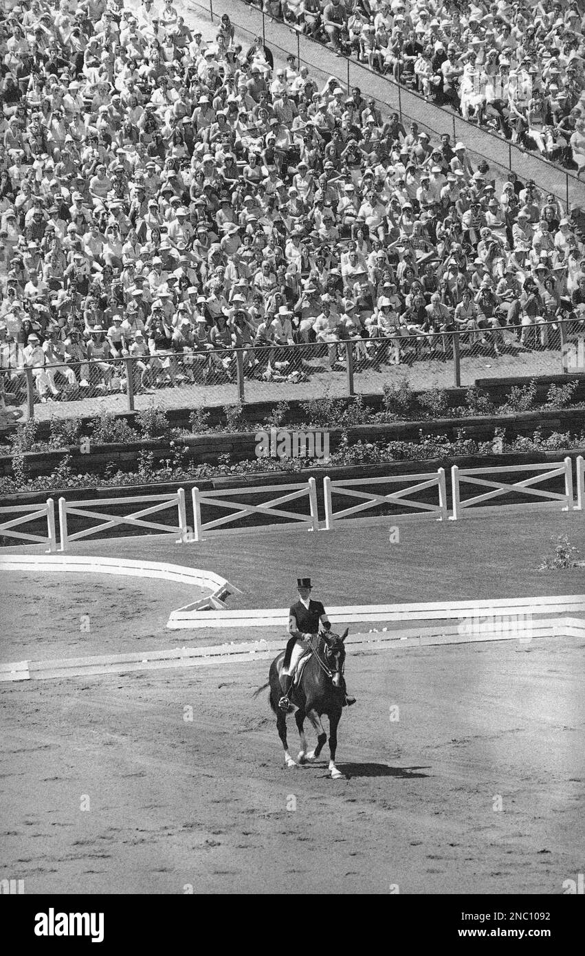 Under the eyes of a crowd of spectators Princess Anne of Great Britain ...