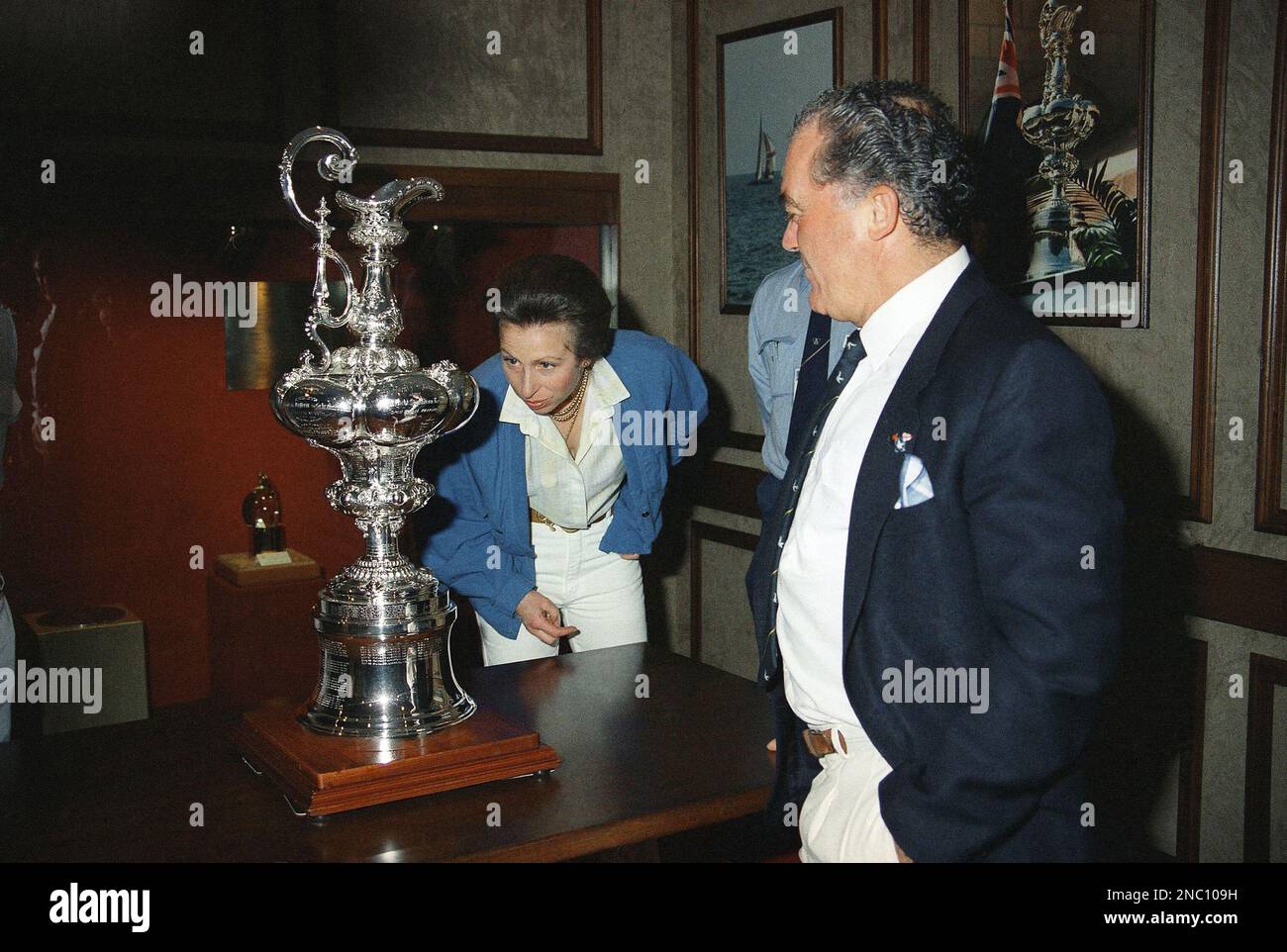Princess Anne gets a close look at the America’s Cup in the trophy room ...