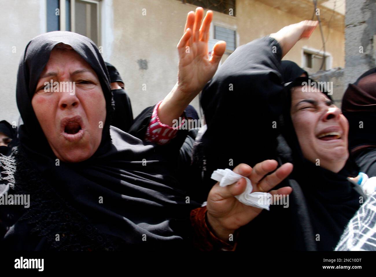 Palestinian women react during the funeral of Hamas militant Abdallah ...