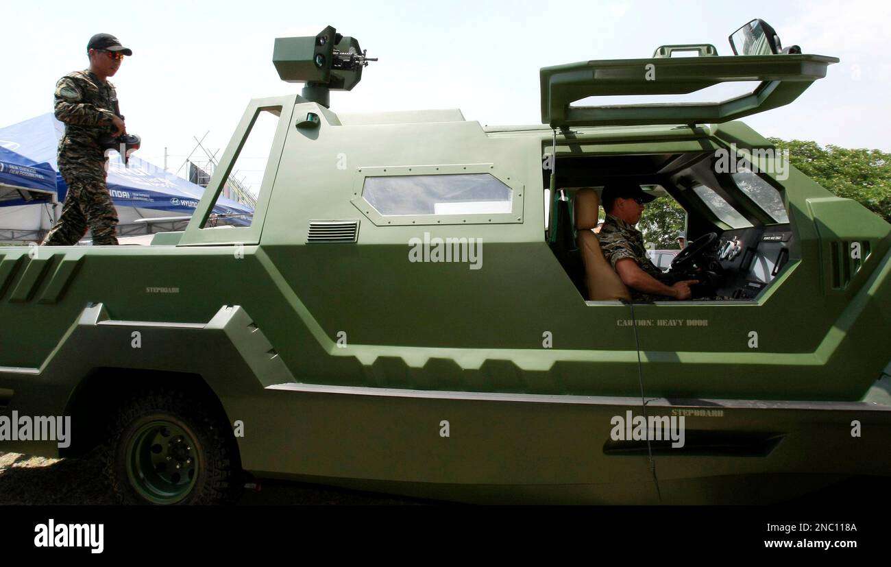 Philippine Navy SEALS board the experimental amphibious vehicle dubbed ...